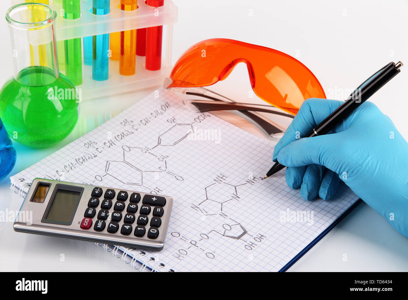 Hand scientist writing formulas isolated on white Stock Photo - Alamy