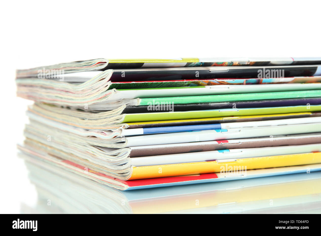 Many magazines isolated on white Stock Photo - Alamy
