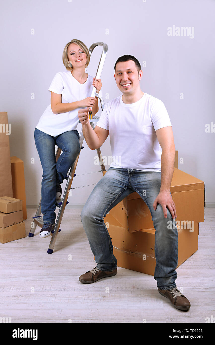 Young couple moving in new house Stock Photo - Alamy