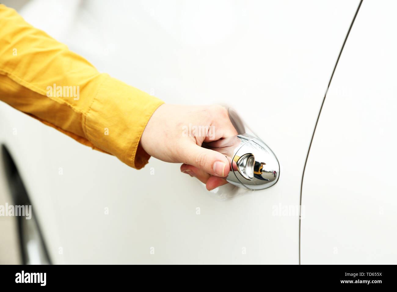 Woman hand opening car door hi-res stock photography and images - Alamy