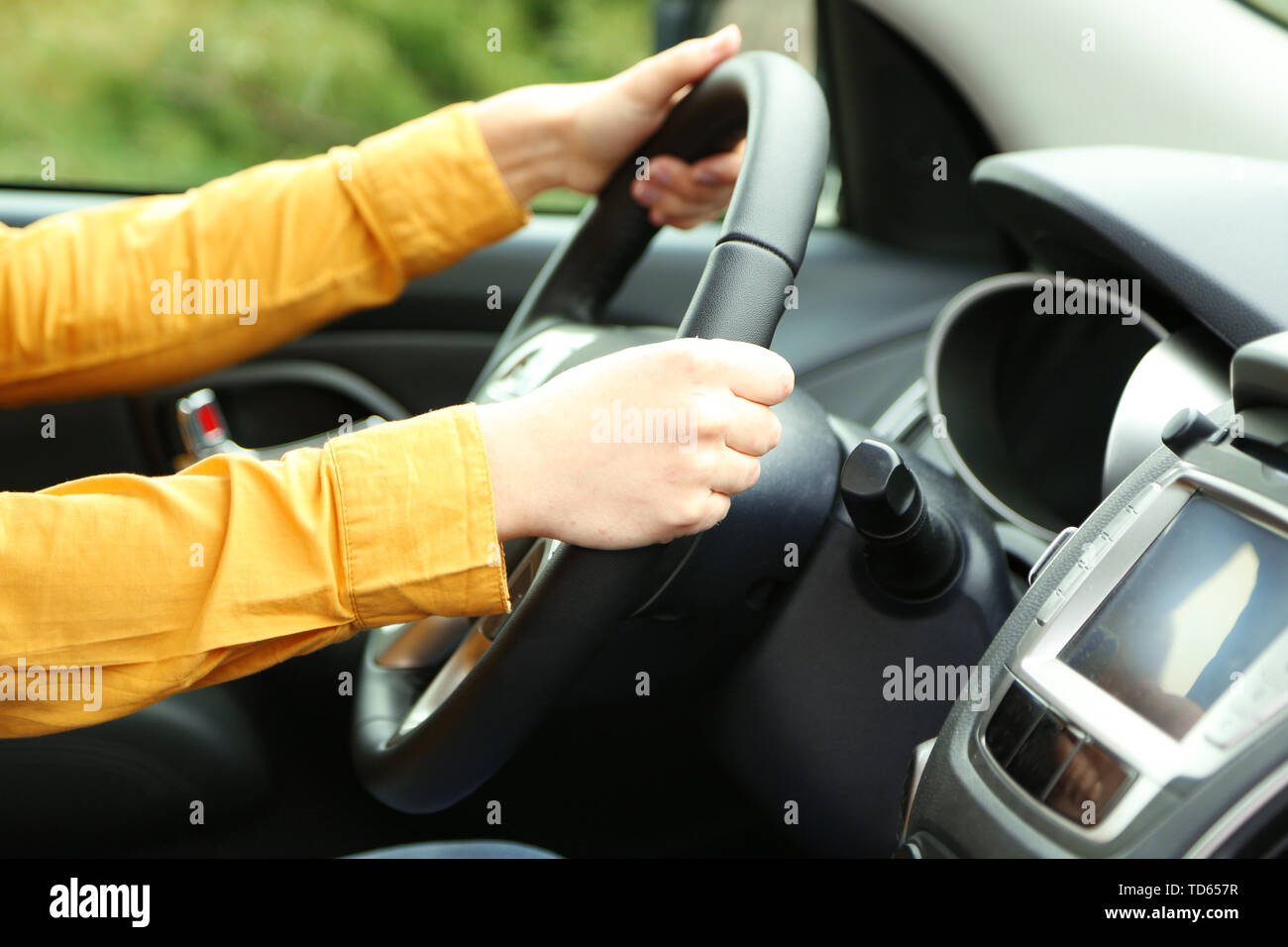 Female hands over wheel hi-res stock photography and images - Alamy