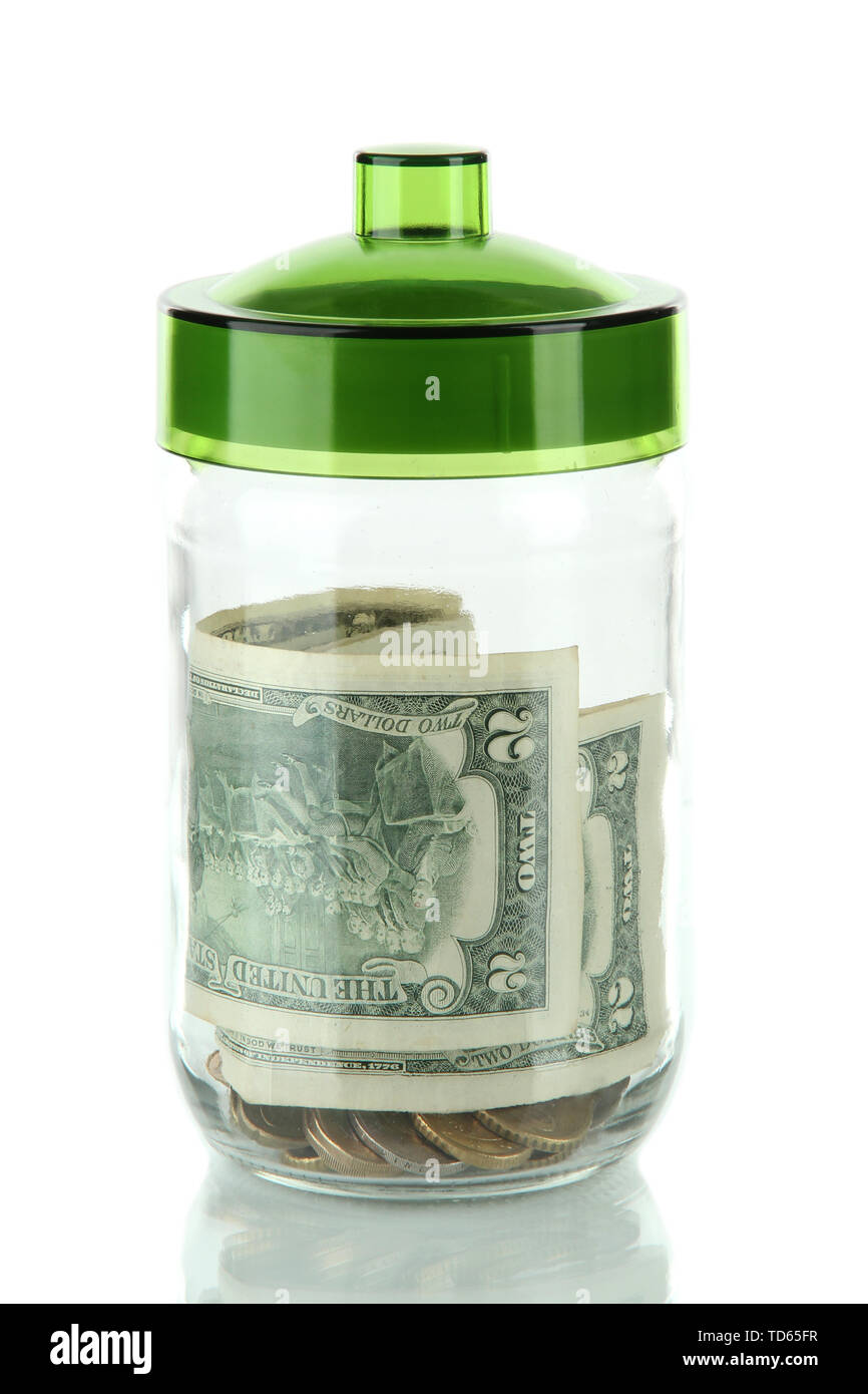 Glass jar with money isolated on white Stock Photo - Alamy