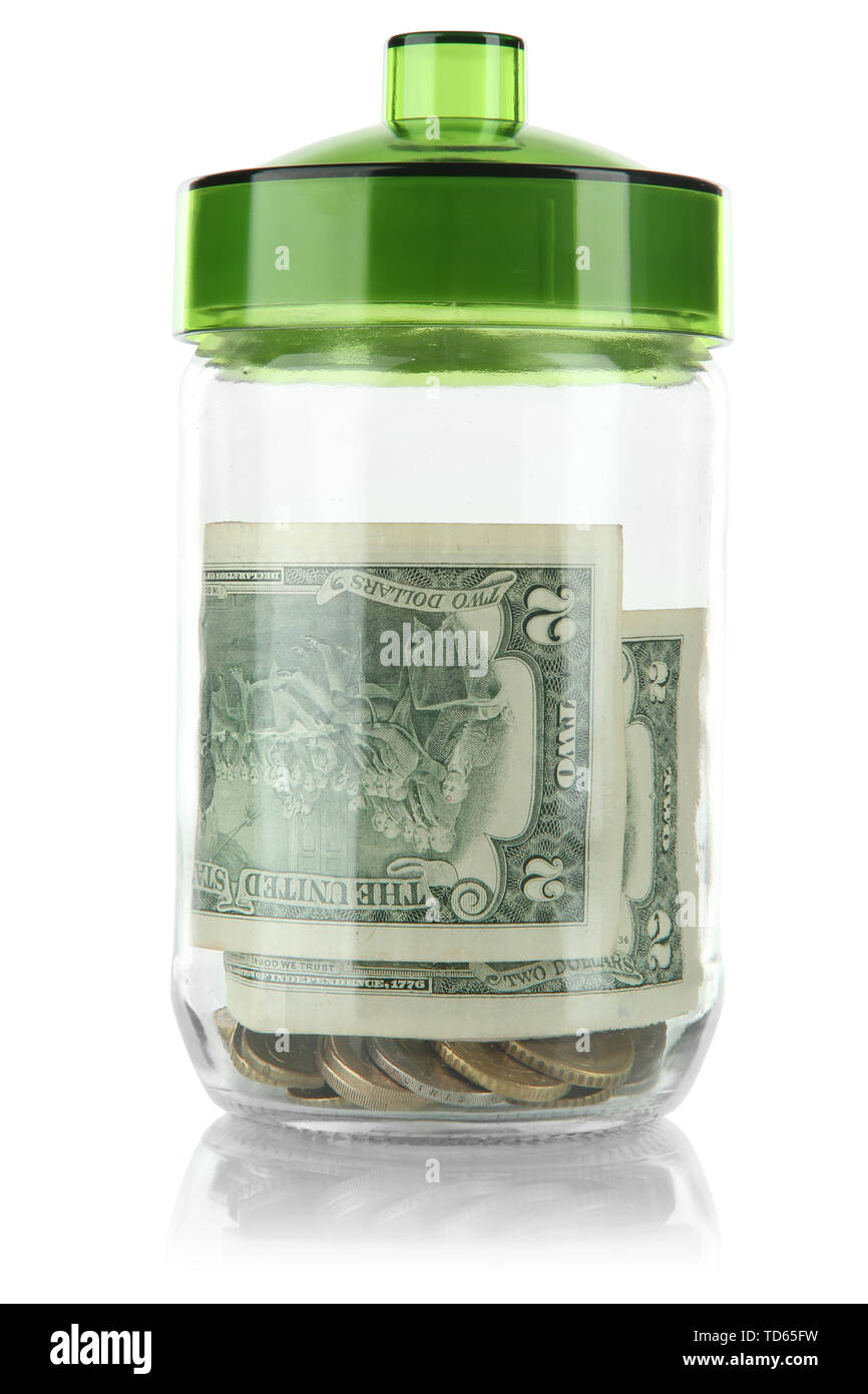 Glass jar with money isolated on white Stock Photo - Alamy