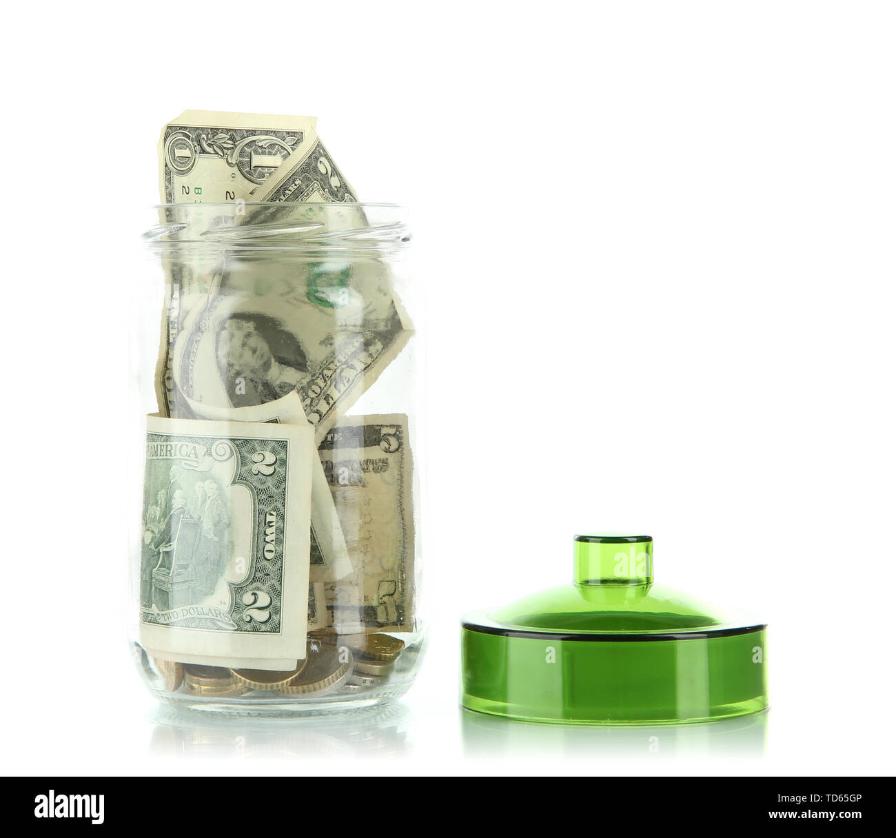 Glass jar with money isolated on white Stock Photo - Alamy