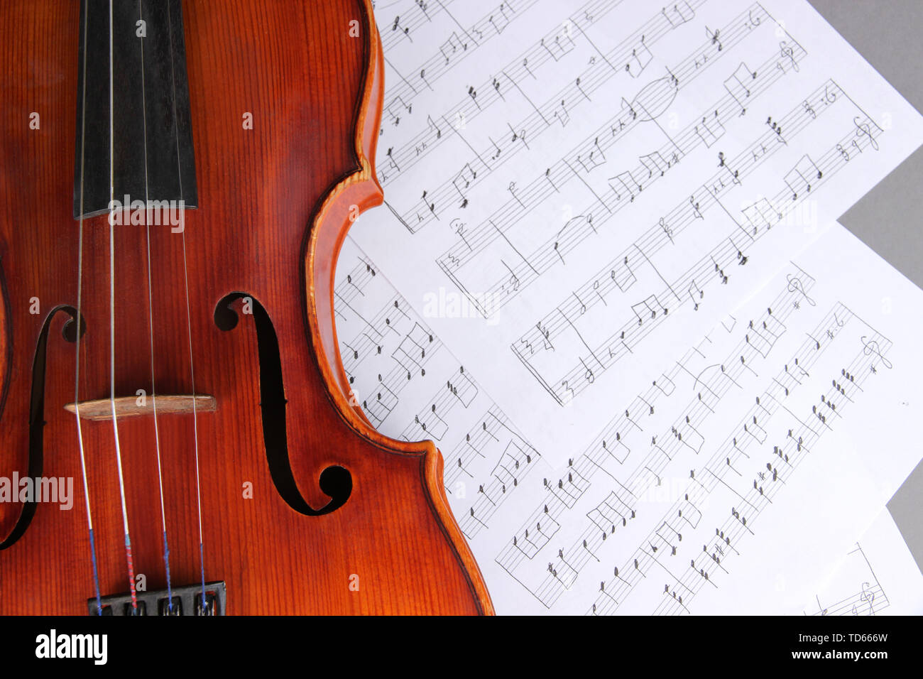 Classical violin on notes Stock Photo - Alamy