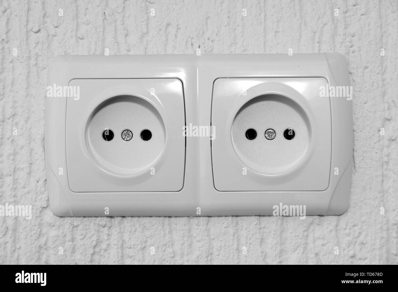 Two sockets Black and White Stock Photos & Images - Alamy