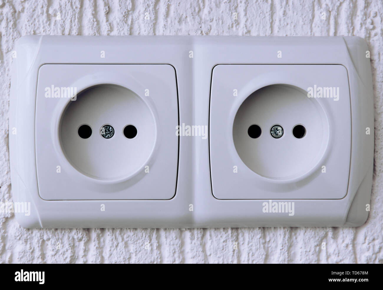 Two sockets on wall Stock Photo - Alamy