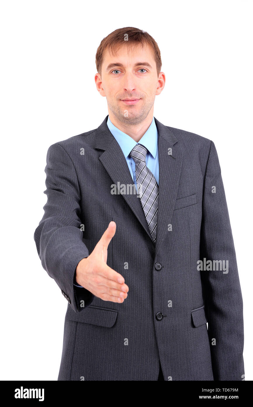 Yong businessman giving his hand for a handshake isolated on white ...