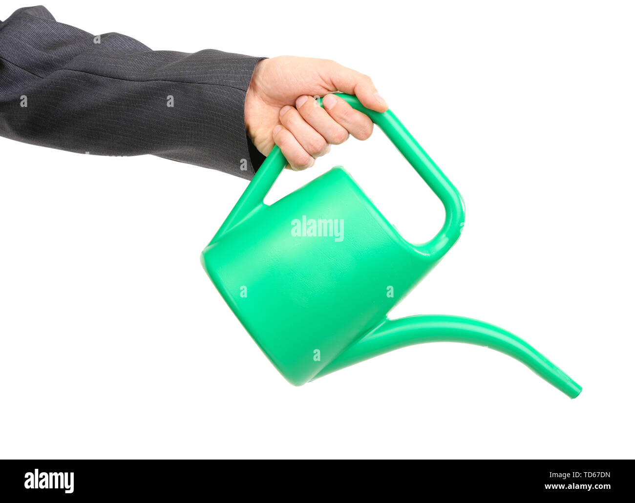Hand of a businessman pouring water from watering can isolated on white ...