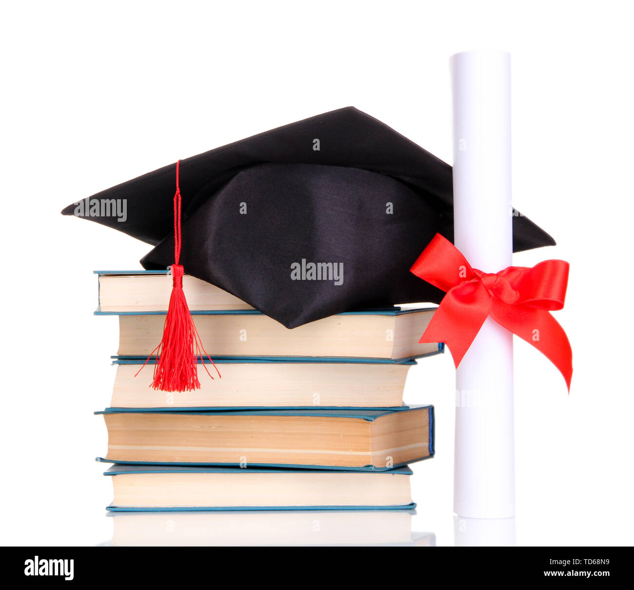 Graduation hat scroll red book hi-res stock photography and images - Alamy