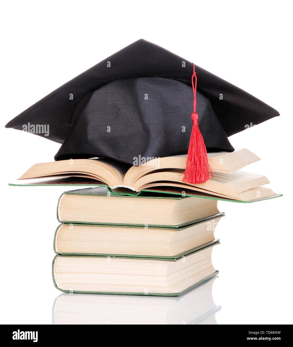 Grad hat with books isolated on white Stock Photo - Alamy