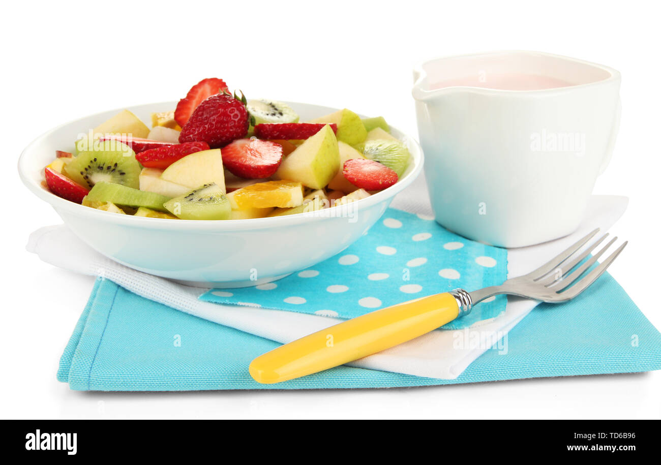 Useful fruit salad of fresh fruits and berries in bowl isolated on ...