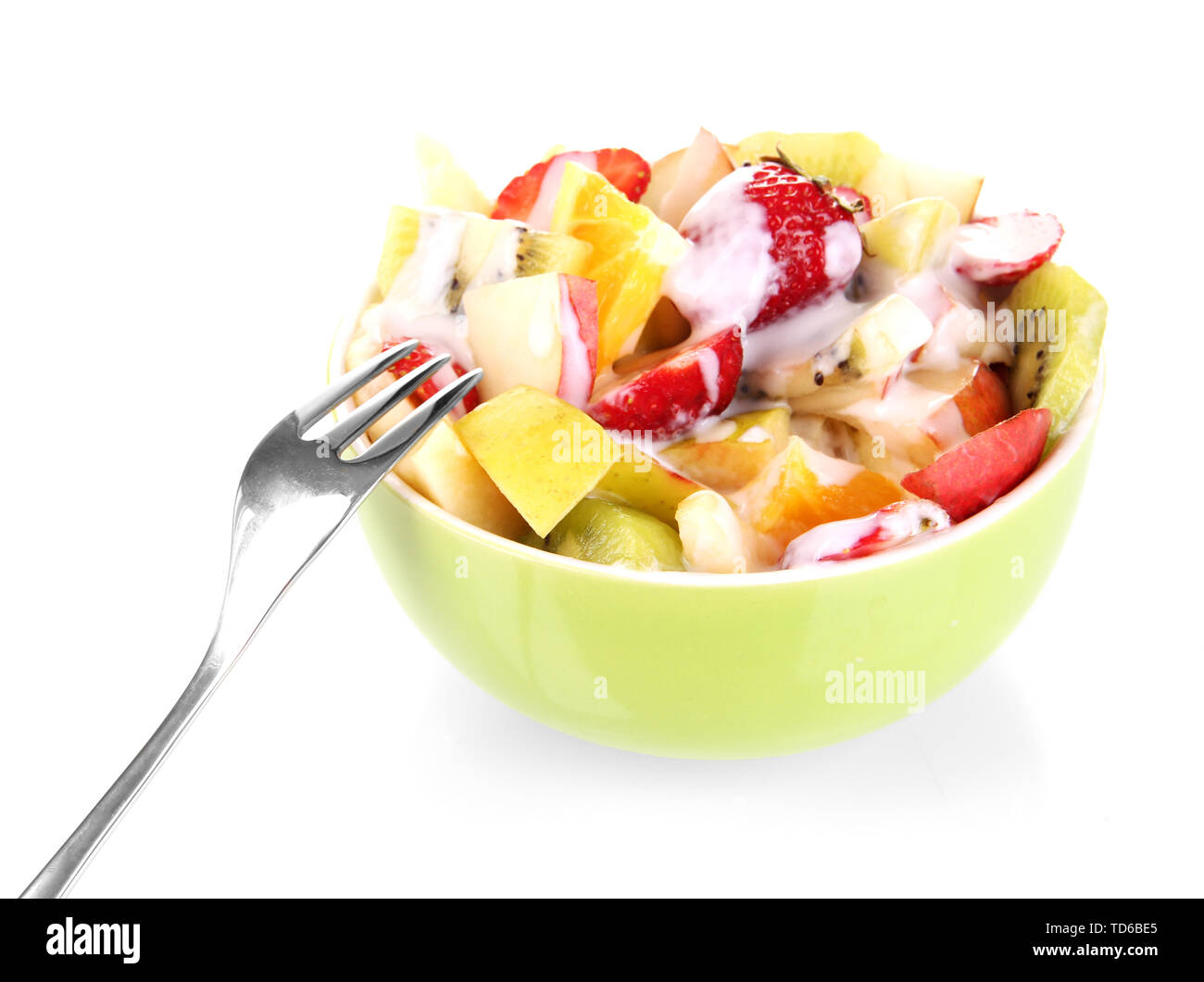 Useful fruit salad of fresh fruits and berries in bowl isolated on ...