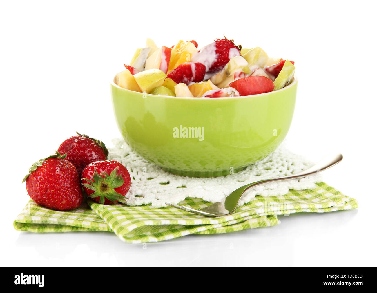 Useful fruit salad of fresh fruits and berries in bowl isolated on ...