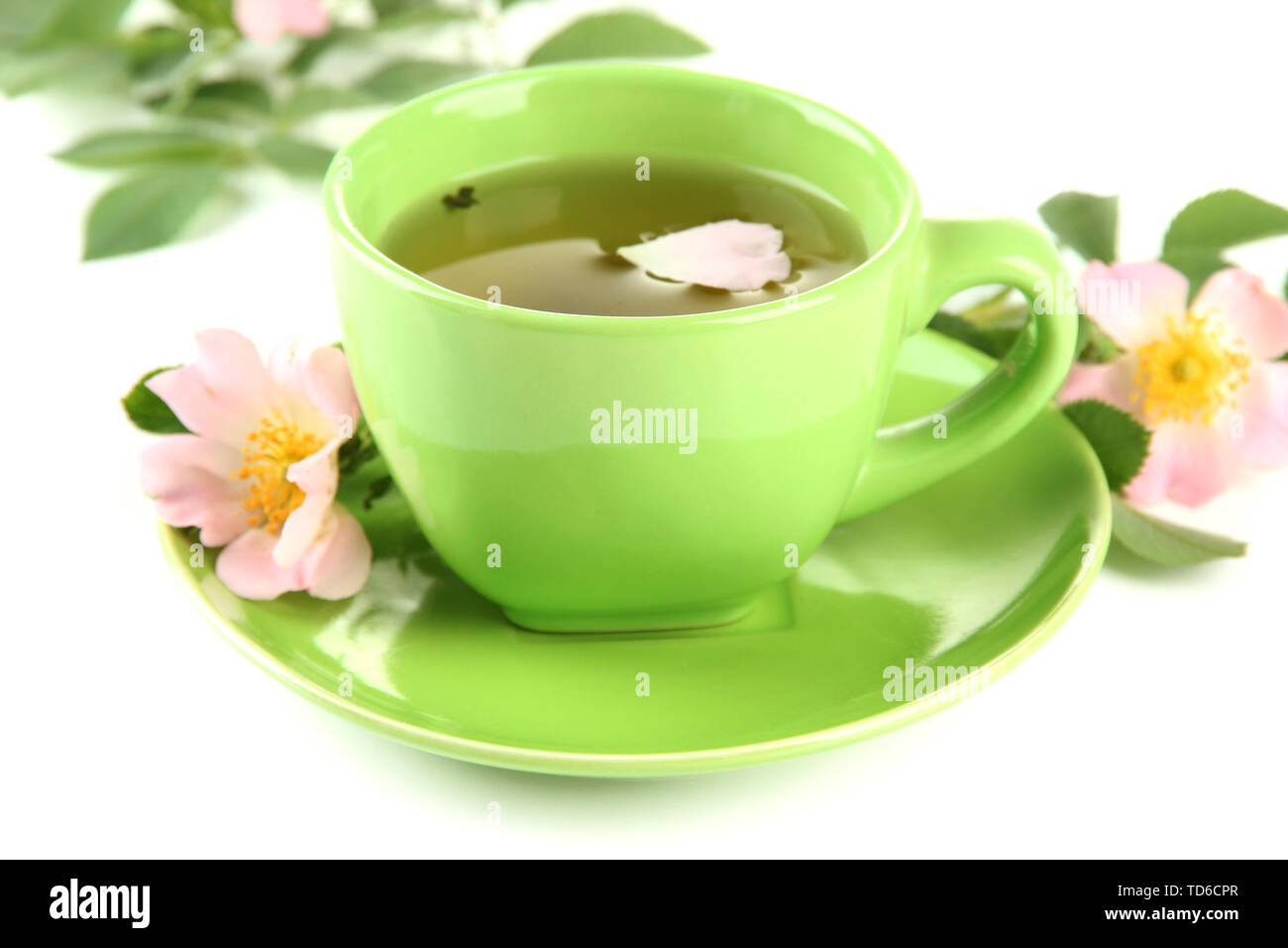 Cup of herbal tea with hip rose flowers, isolated on white Stock Photo ...
