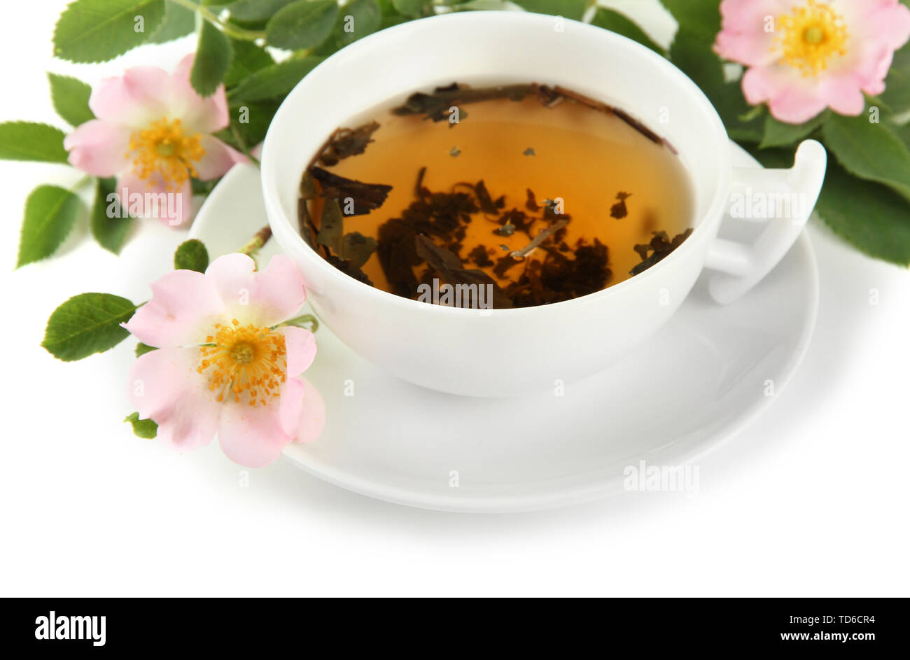 Cup of herbal tea with hip rose flowers, isolated on white Stock Photo ...