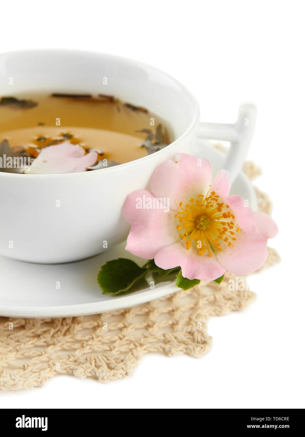Cup of herbal tea with hip rose flowers, isolated on white Stock Photo ...