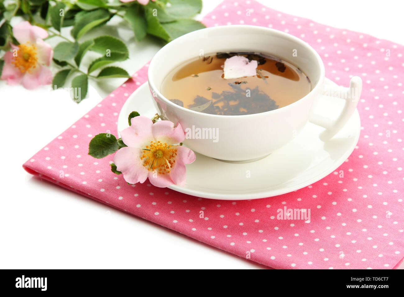 Cup of herbal tea with hip rose flowers, isolated on white Stock Photo ...