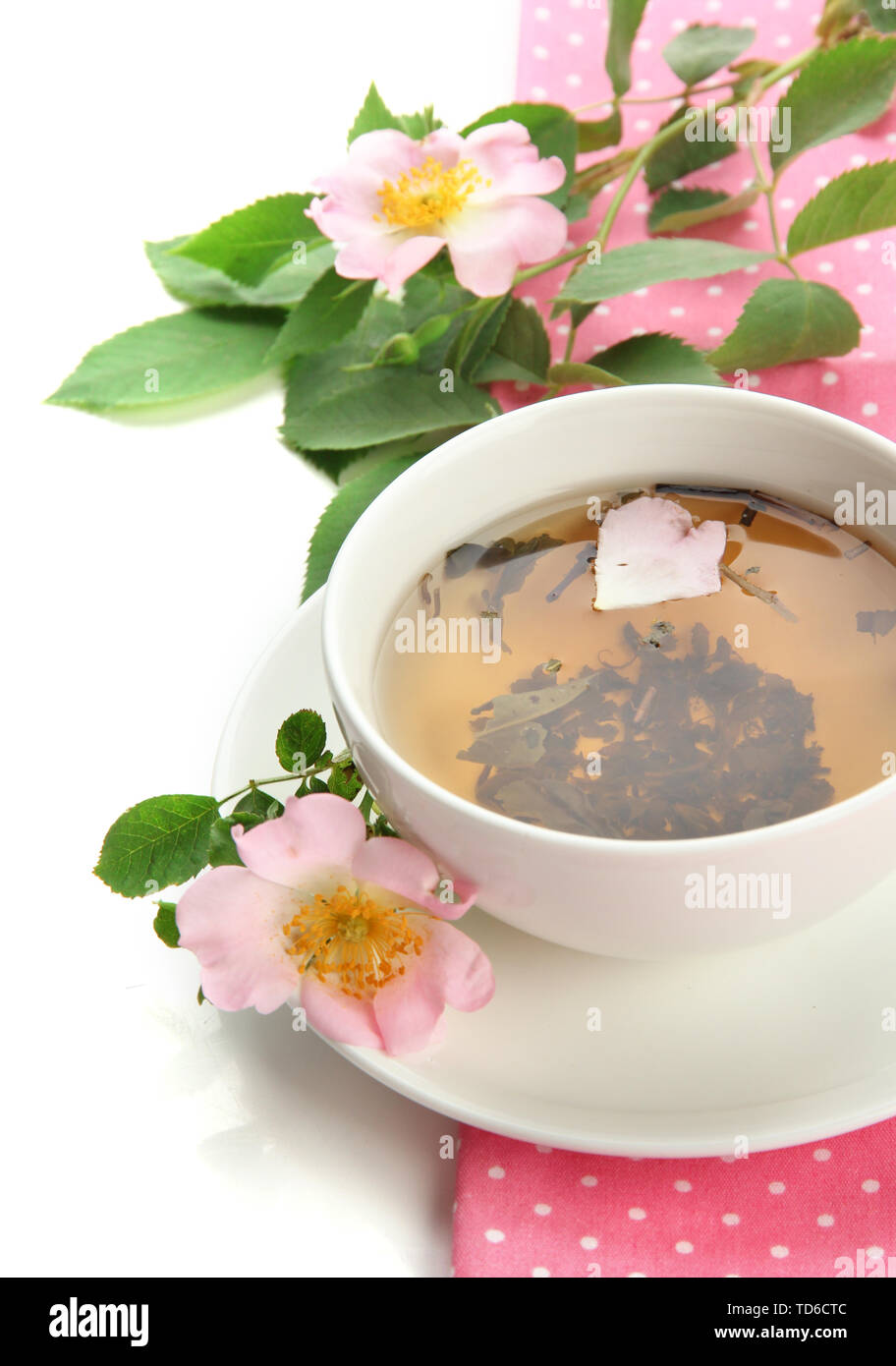 Cup of herbal tea with hip rose flowers, isolated on white Stock Photo ...
