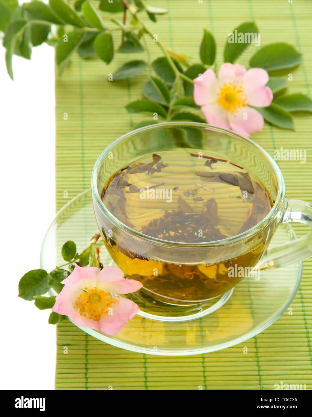 Cup of herbal tea with hip rose flowers, isolated on white Stock Photo ...