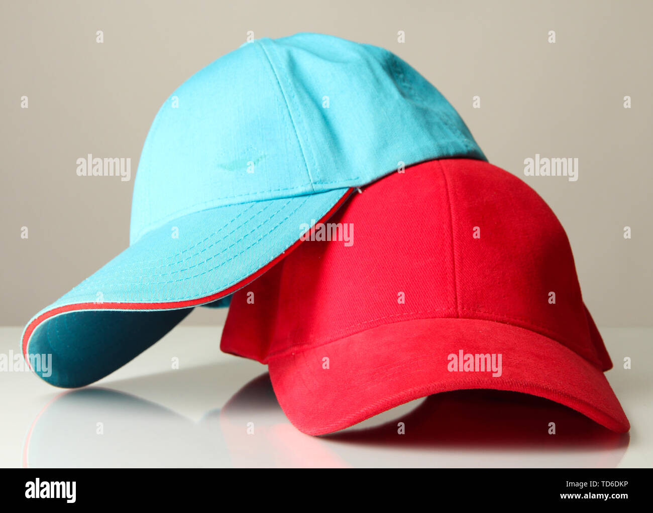 Elegant red caps hi-res stock photography and images - Alamy