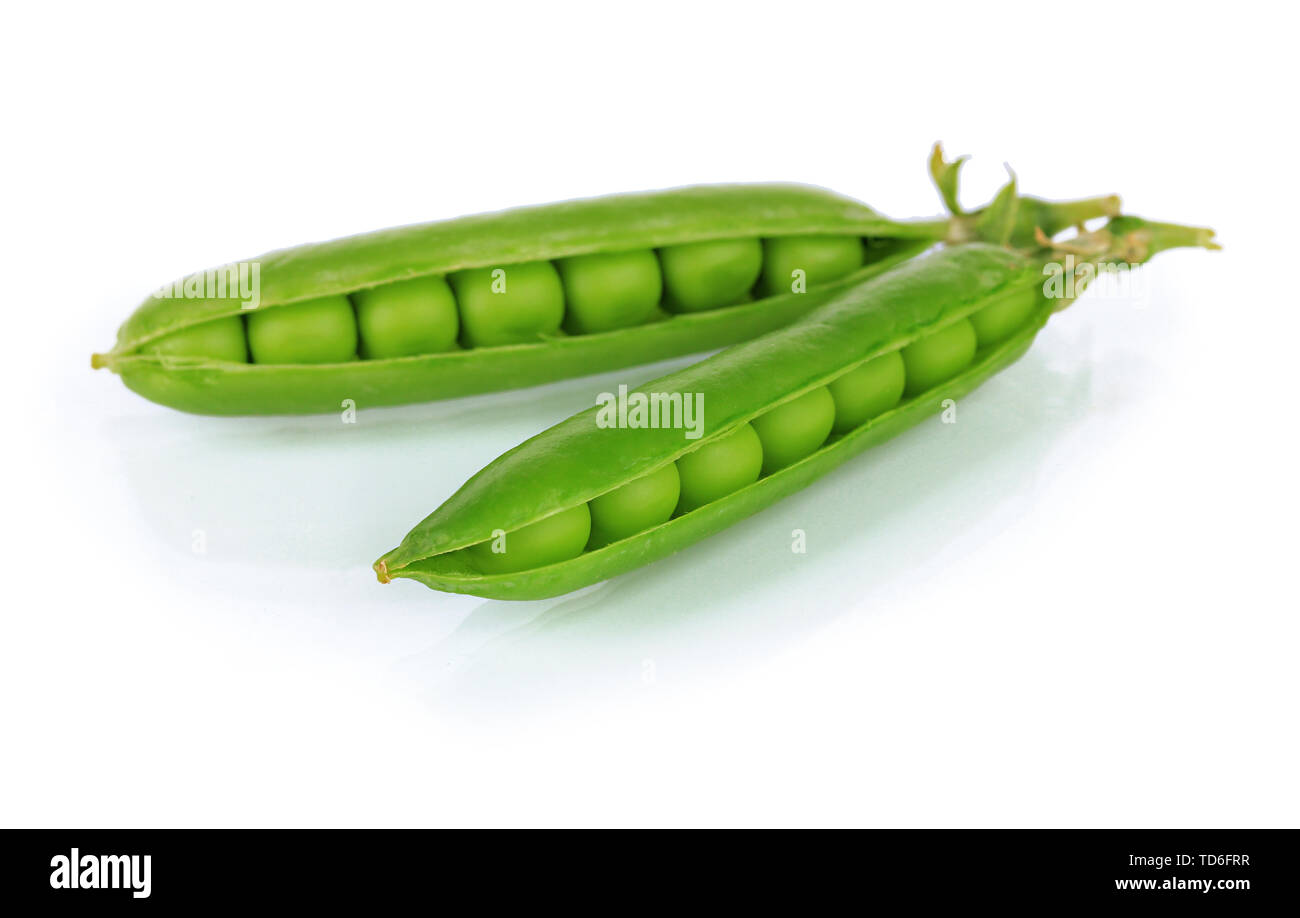 Sweet green peas isolated on white Stock Photo - Alamy