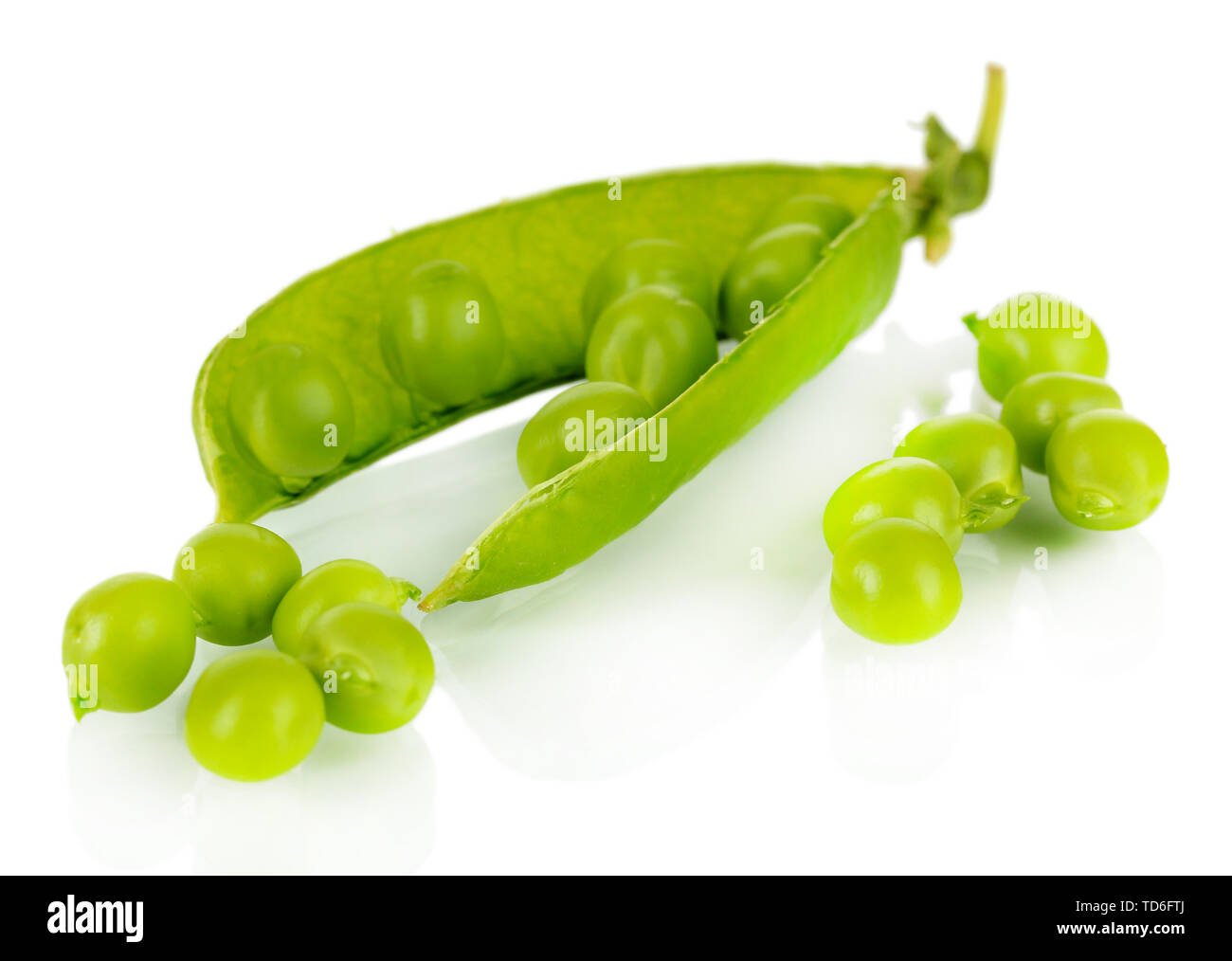 Sweet green peas isolated on white Stock Photo - Alamy
