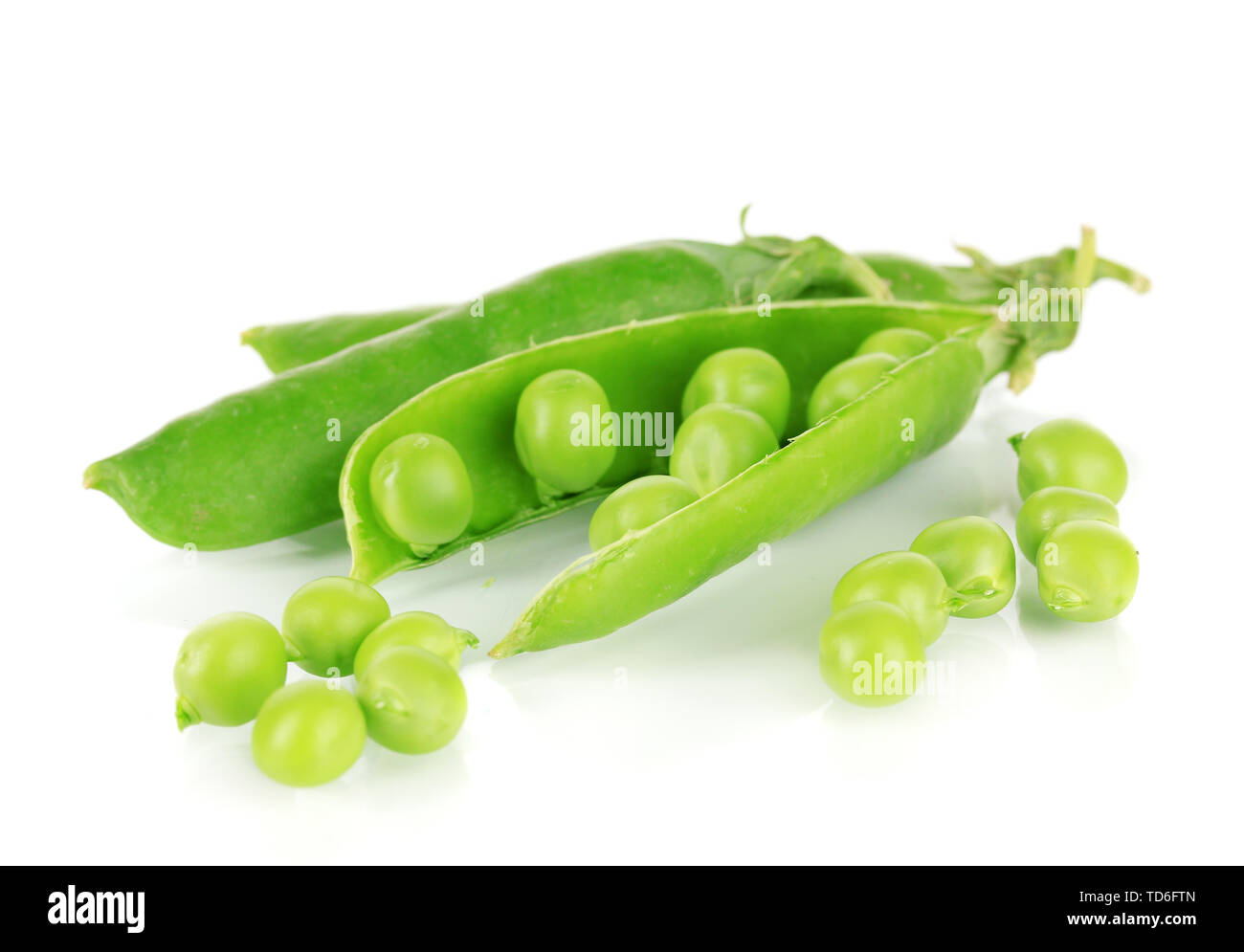Sweet green peas isolated on white Stock Photo - Alamy