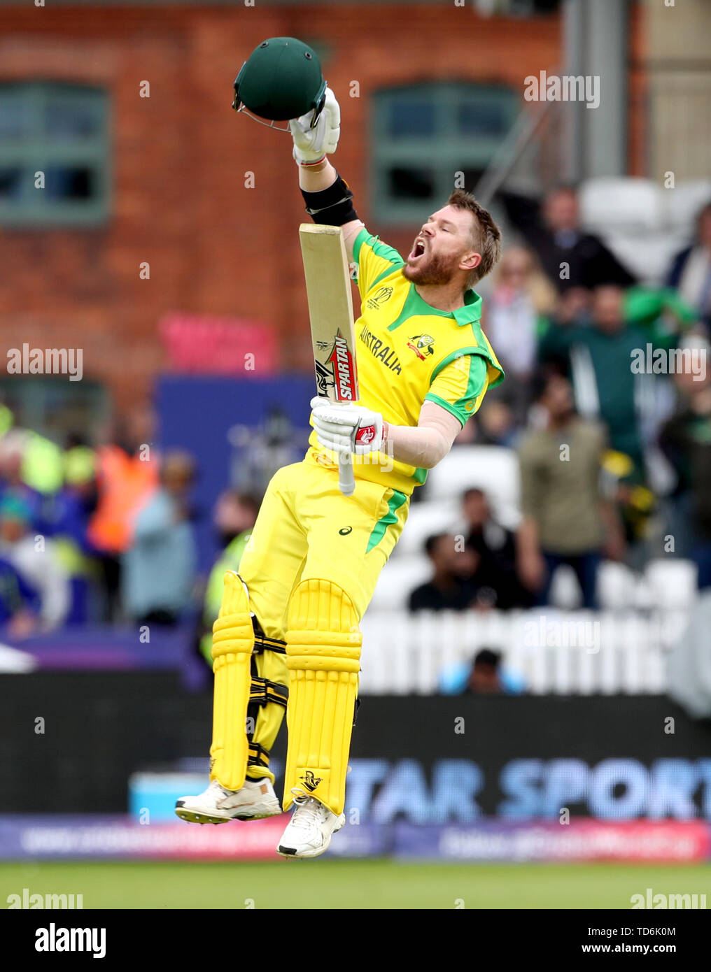Australia's David Warner celebrates his century during the ICC Cricket ...