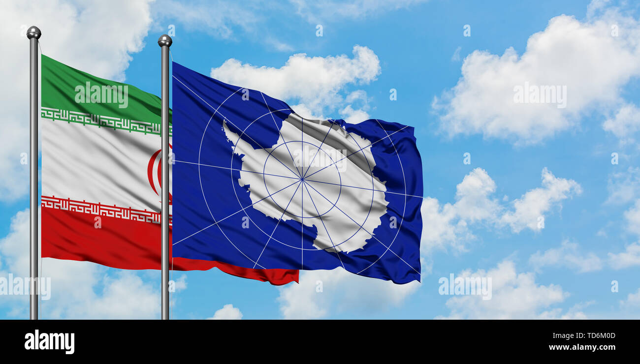 Iran and Antarctica flag waving in the wind against white cloudy blue ...