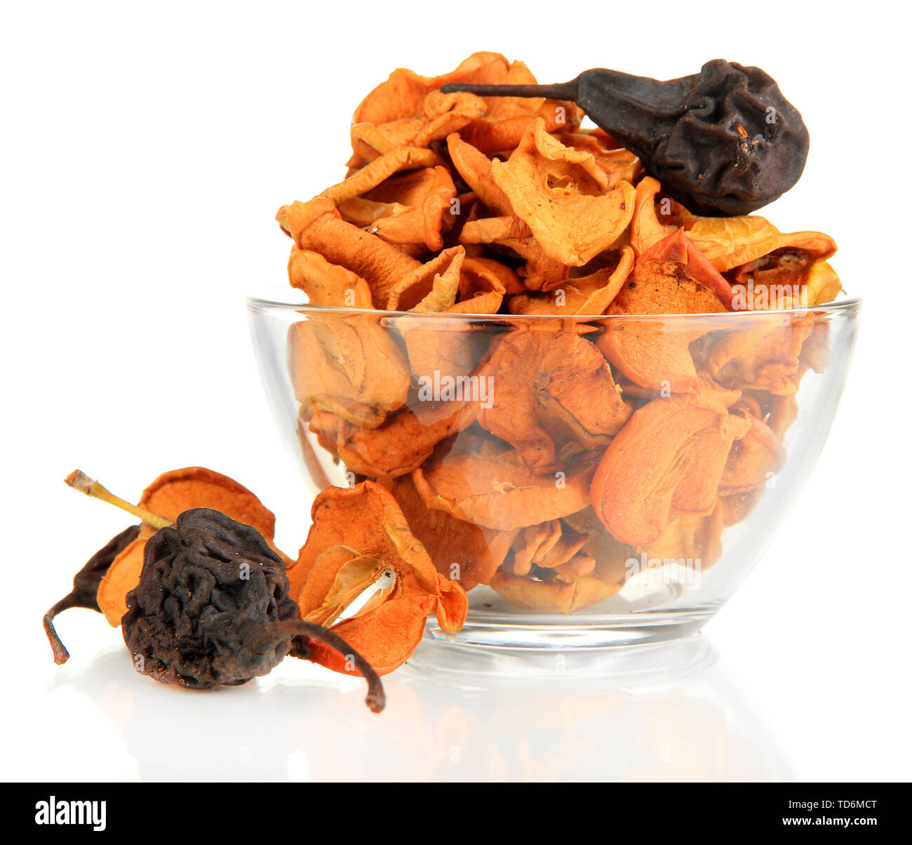 Assorted dried fruits in glass bowl isolated on white Stock Photo - Alamy