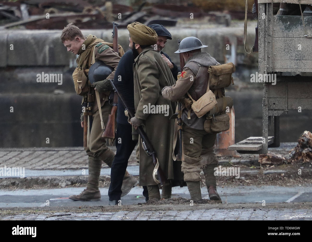 Director Sam Mendes (3rd left) thanks cast members on the set of his ...