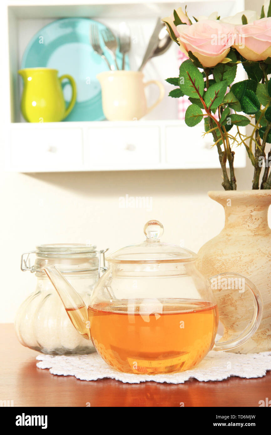 Kitchen composition on table on shelf background Stock Photo - Alamy