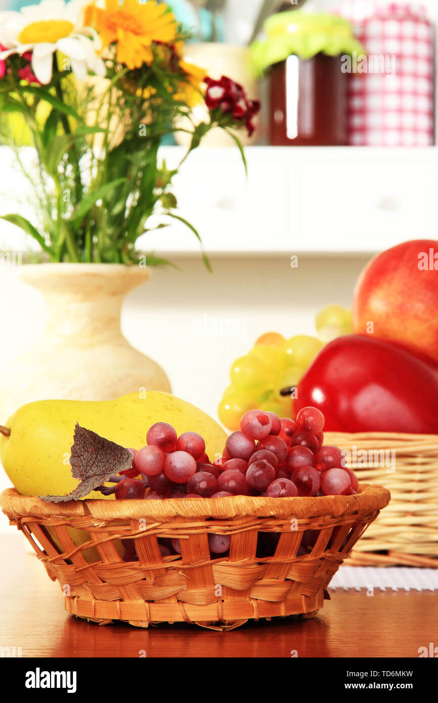 Kitchen composition on table on shelf background Stock Photo - Alamy