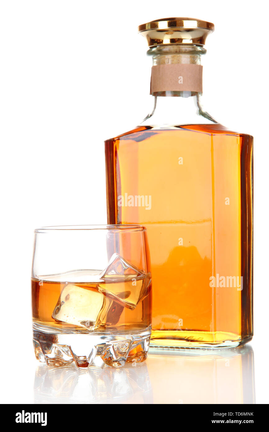 Glass of brandy and bottle isolated on white Stock Photo - Alamy