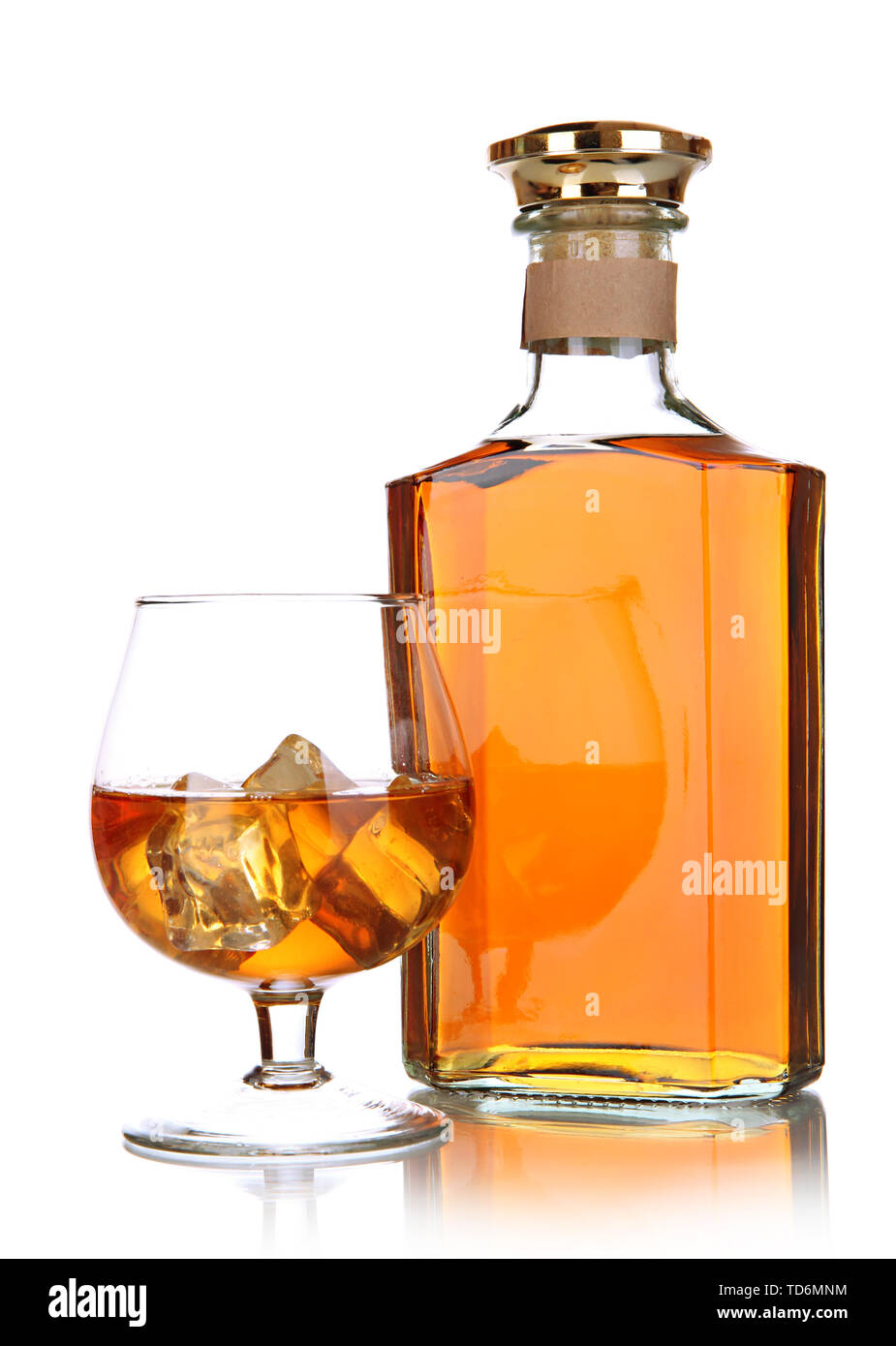 Glass of brandy and bottle isolated on white Stock Photo - Alamy