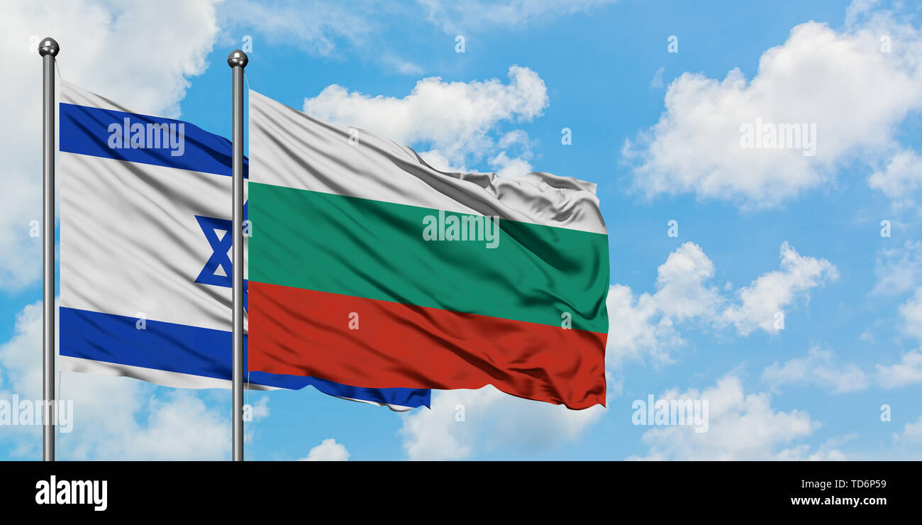 Israel and Bulgaria flag waving in the wind against white cloudy blue ...