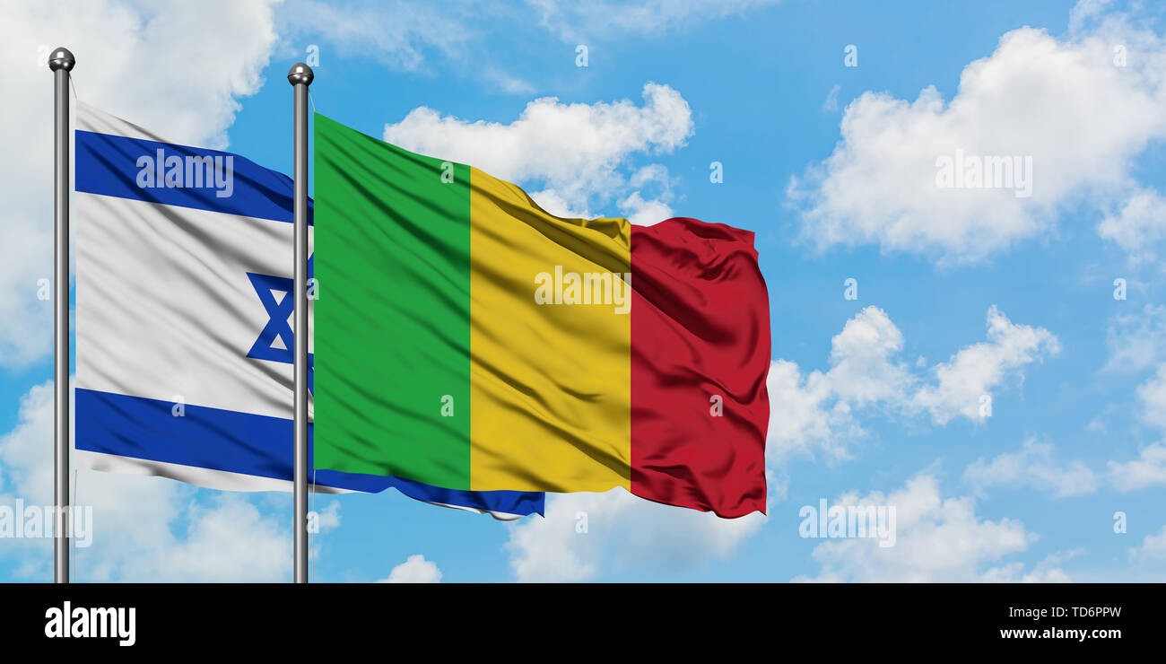 Israel and Mali flag waving in the wind against white cloudy blue sky ...