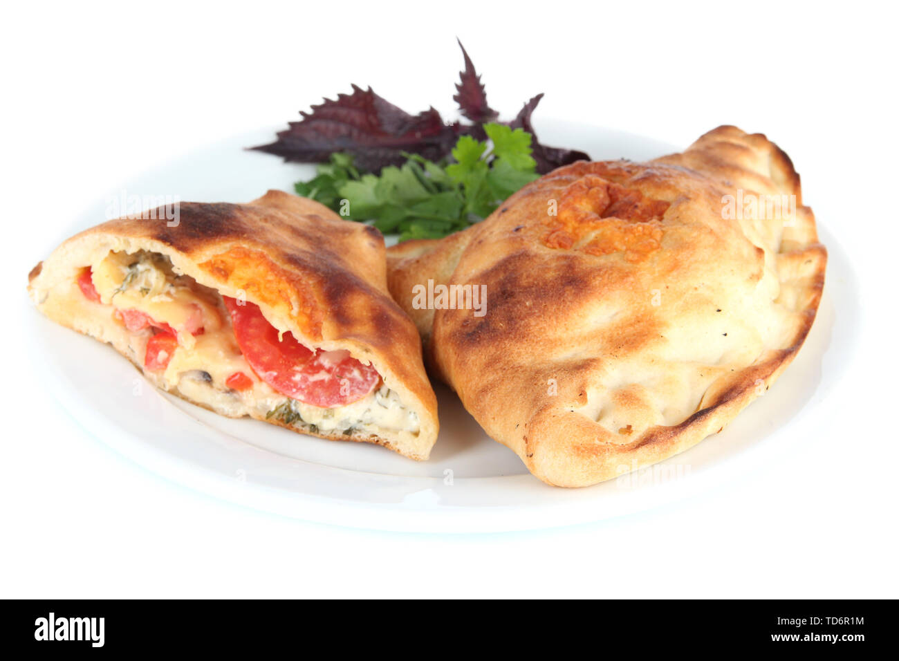 Pizza calzone on table isolated on white Stock Photo - Alamy