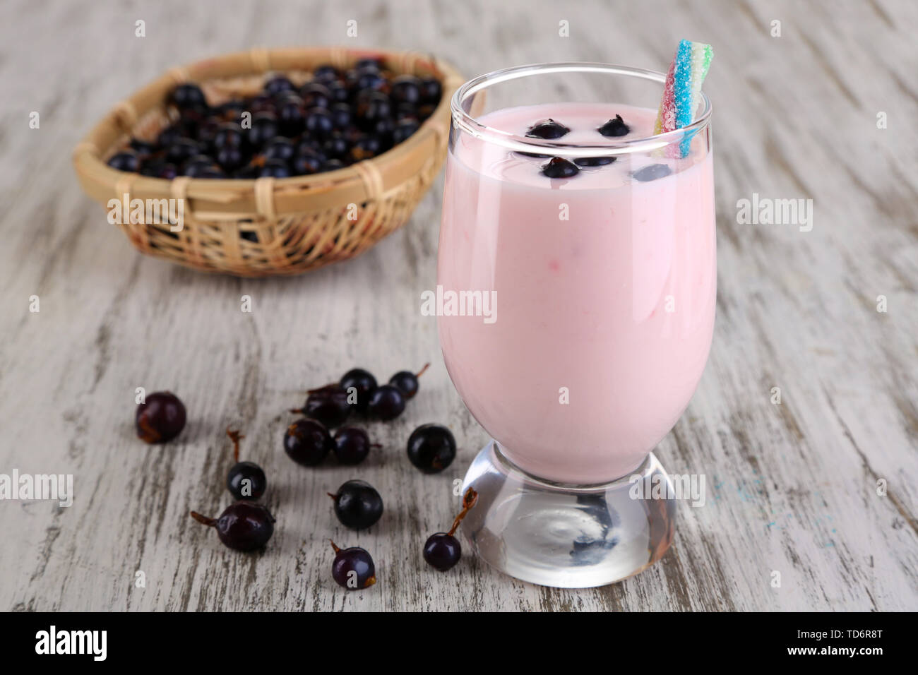 Delicious milk shake with blackberry on wooden table close-up Stock ...