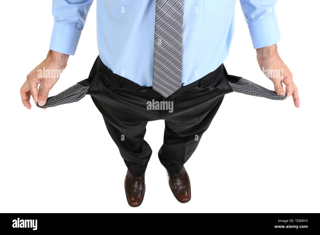 Business man showing his empty pockets, isolated on white Stock Photo ...