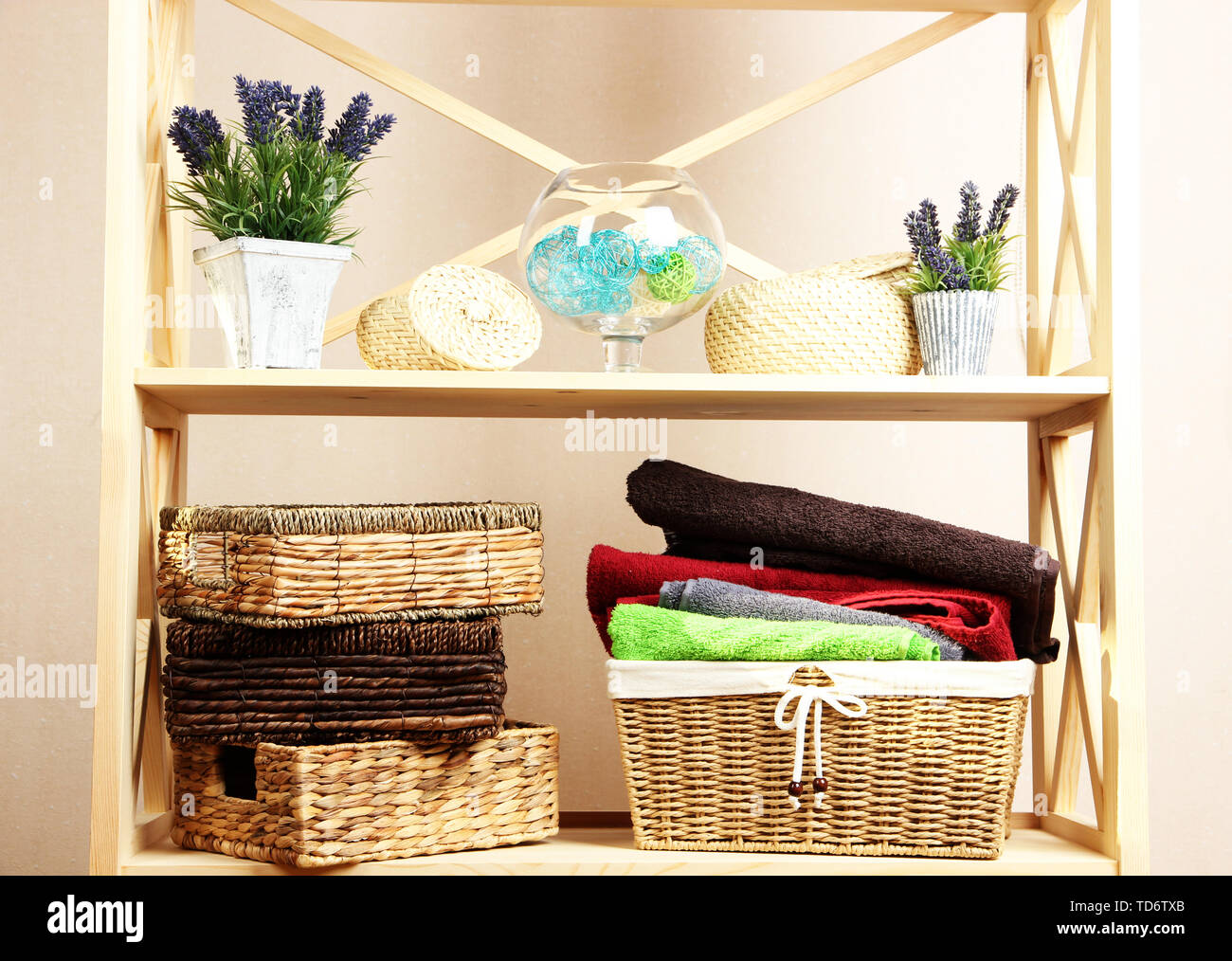 Beautiful white shelves with different home related objects, on color ...