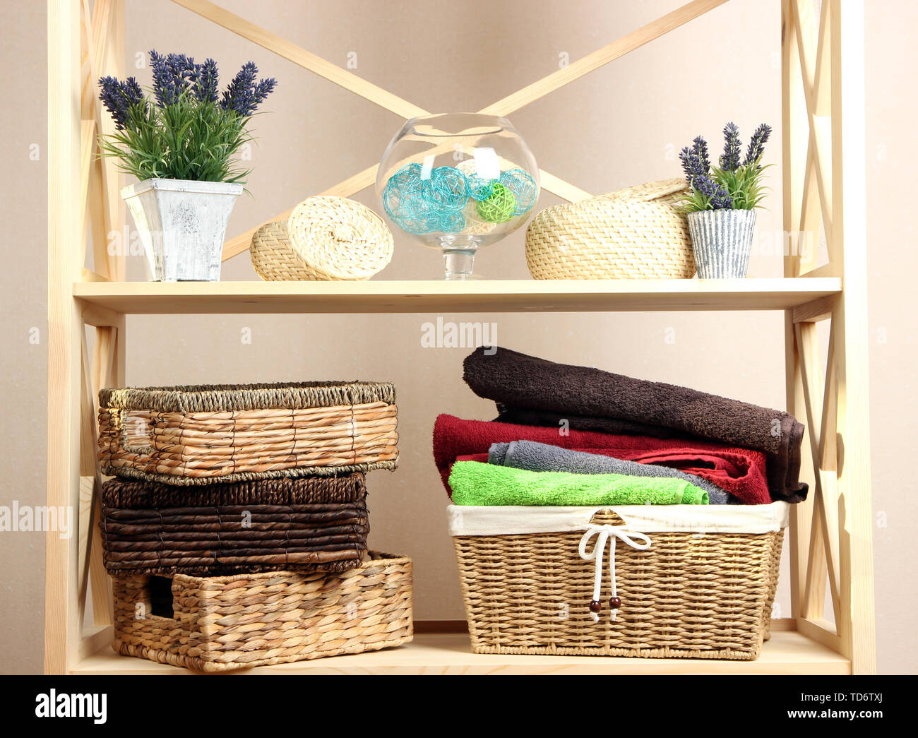 Beautiful white shelves with different home related objects, on color ...