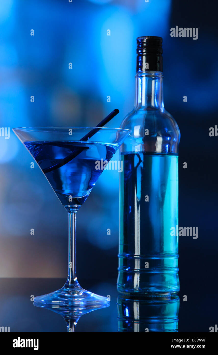 Glass of cocktail on bright background Stock Photo - Alamy