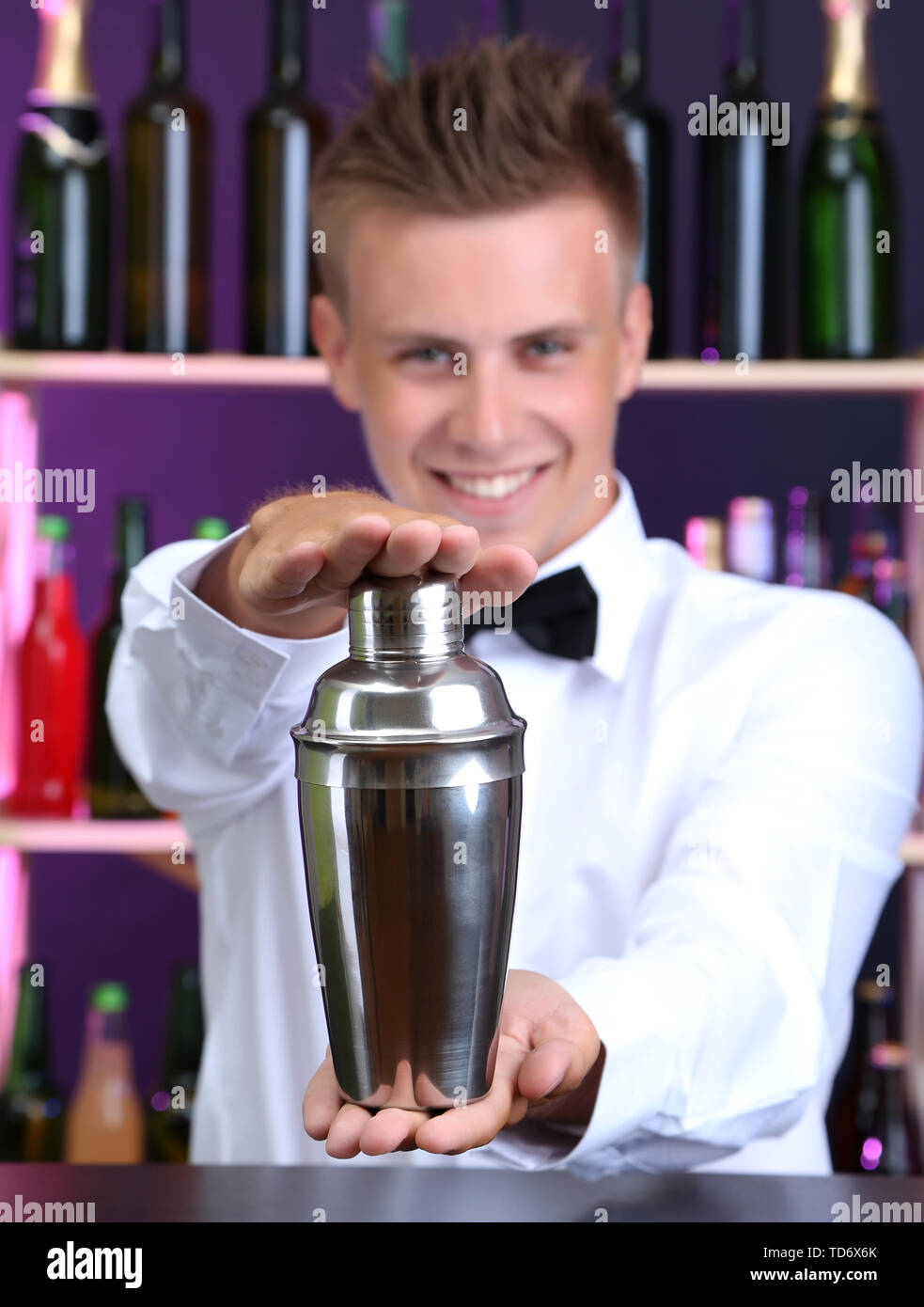 Portrait of handsome barman with shaker, at bar Stock Photo - Alamy