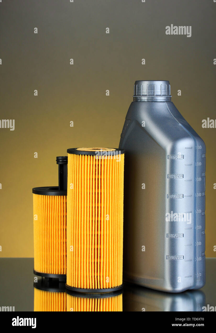 Car oil filters and motor oil can on dark color background Stock Photo ...