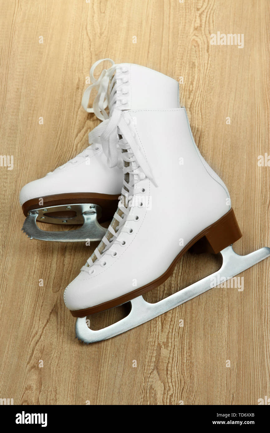 Figure skates on table close-up Stock Photo - Alamy