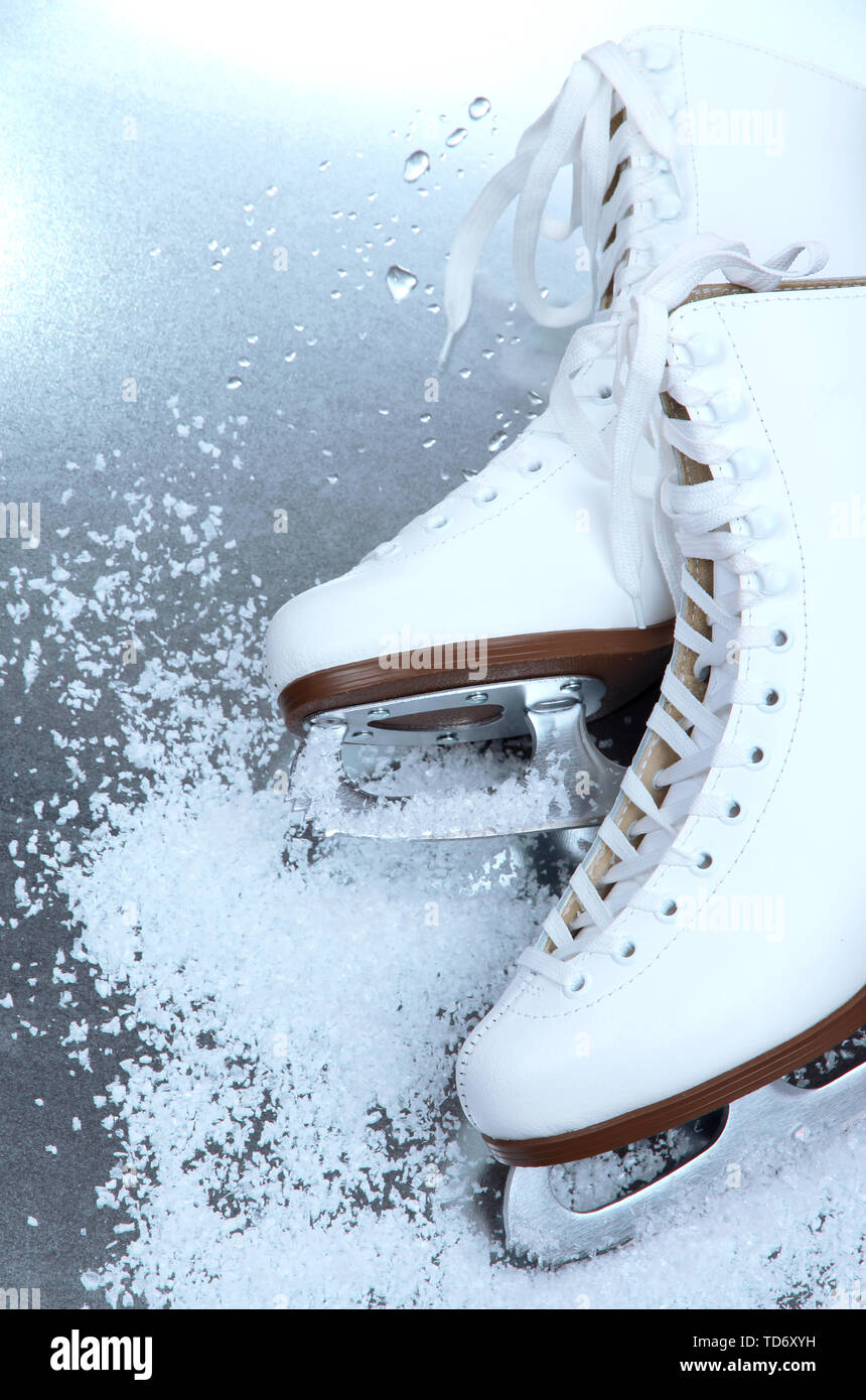 Figure skates in snow close-up Stock Photo - Alamy