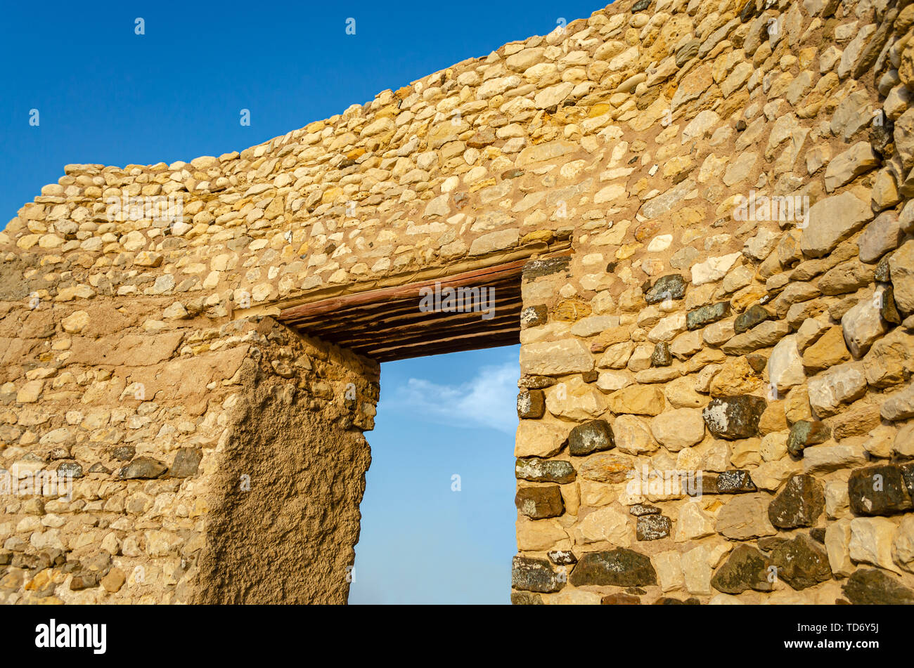 Historical stone arch and a clear blue sky. From Muttrah, Muscat, Oman ...
