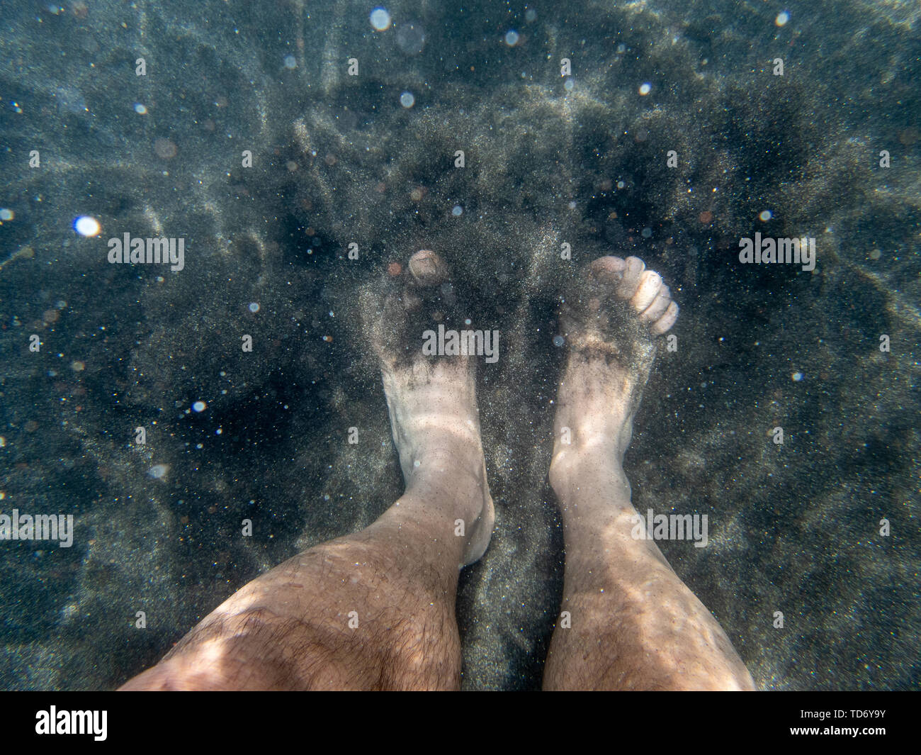 Photograph of a few feet underwater taken from inside the sea with an ...